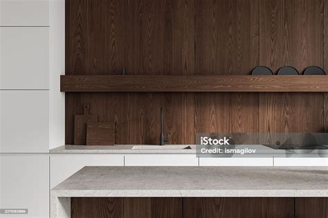 목재 패널 벽 콘크리트 조리대 제품 모형 또는 프레젠테이션 전시를 위한 미니멀한 디자인 요소가 있는 현대적인 주방 인테리어 3d 렌더링 0명에 대한 스톡 사진 및 기타