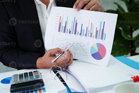 Business Woman Working And Analysis With Statistic Graph In Office 21633244 Stock Photo At Vecteezy