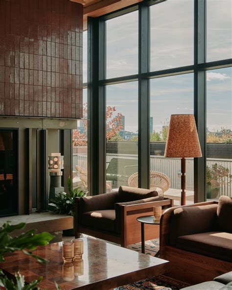 Large Fireplaces Bookend Evangeline Rooftop Bar At Ace Hotel Toronto