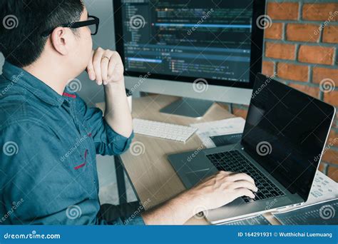 Developing Programming And Coding Technology Working In A Software Develop Company Office Stock