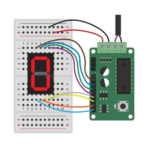 microcontroller and breadboard circuit with 7 segment display stock