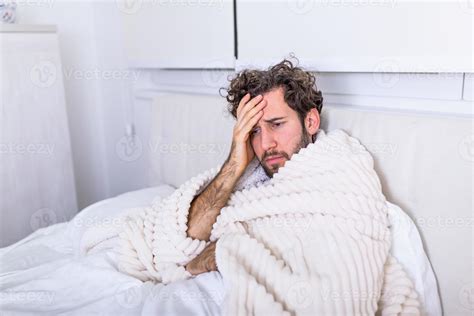 Sick Man With Seasonal Infections Flu Allergy Lying In Bed Sick