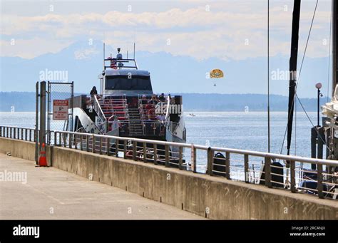 Salish Sea Tours Boat Orca One Arriving At Pier 57 With A Parasail With