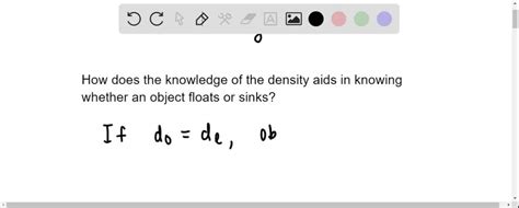 solved consider a ball of uniform density floating exactly in at the boundary between two