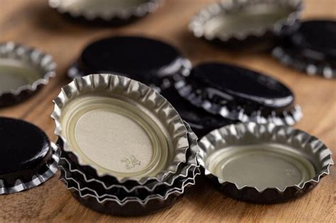 Premium Photo Black Cap Of Beer Bottle In Selective Focus