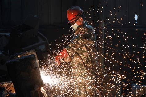 china factory output beats forecasts weathering tariffs iraqi news
