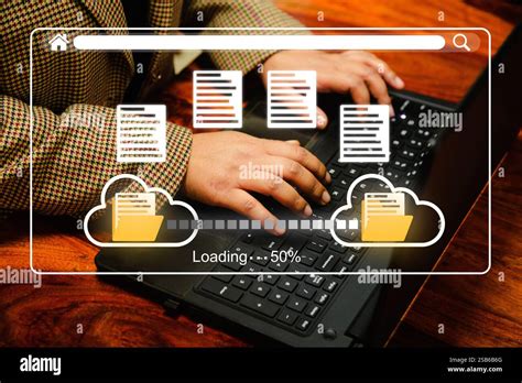 Encryption with file transfer concept : Business man use laptop for remote and download or ...