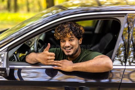 Young Asian Man Showing Thumb Up In His Car Stock Image Image Of