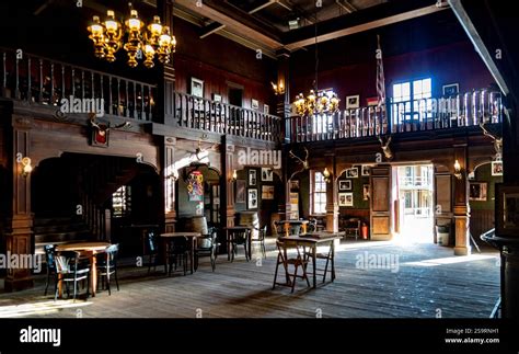 A Spacious Rustic Interior Of A Vintage Saloon With Wooden Floors