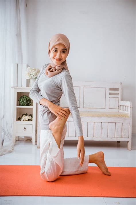 Muslim Woman Instructor Wearing Hijab Doing Yoga Pilates Pose On