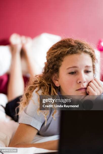 Girl Lying Down Laptop Photos And Premium High Res Pictures Getty Images