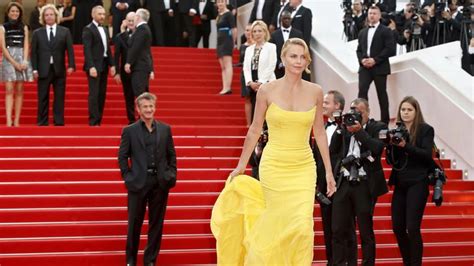 Charlize Theron Stuns At Cannes Film Festival In A Bright Yellow Dior