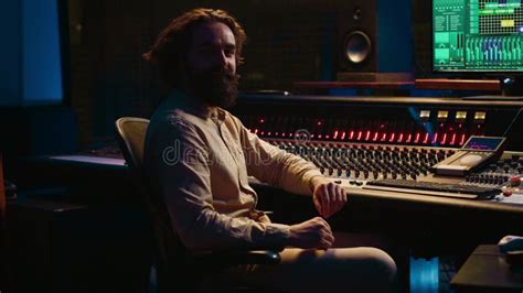 Sound Engineer Mixing And Mastering Tracks In Professional Recording