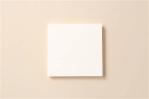 Premium Photo A Close Up Of A White Square On A Beige Background Generative Ai