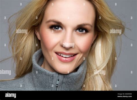 Smiling Blond Woman Stock Photo Alamy