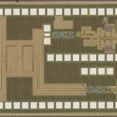 Photograph Of The 2 Band Transmitter Chip With Cross Polarized Antenna