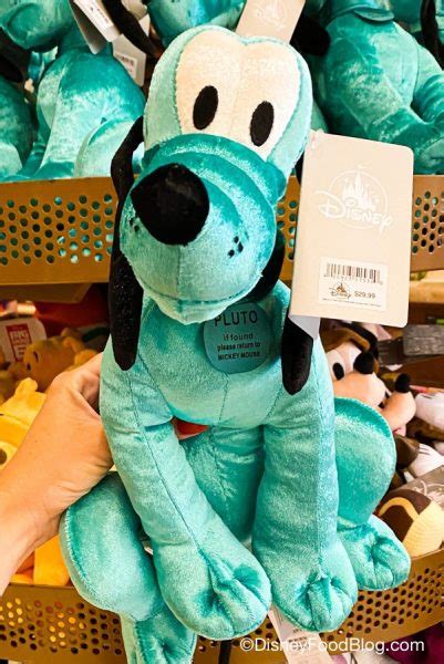 This Pluto Plush Has Gone Teal For Halloween At Disney World