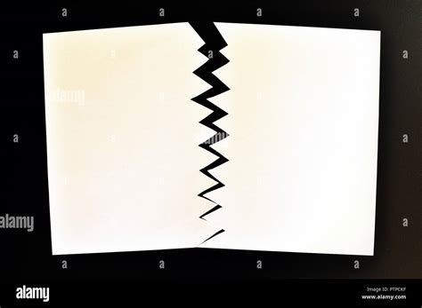 Concept Of Divided Or Separated Torn Paper In Two Sheets White Paper