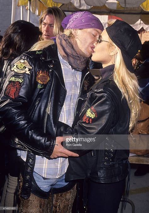 Actress Pamela Anderson And Musician Brett Michaels Of Poison Attend