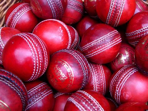 Red And White Cricket Balls Cricket Lady In Red
