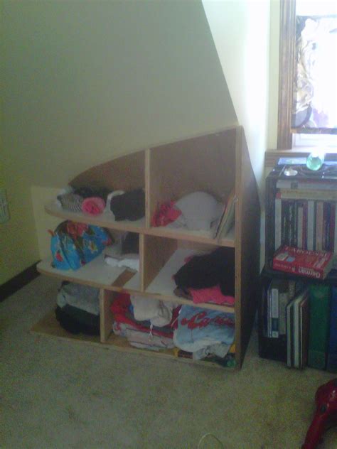 Guerrilla Carpentry Floor Cubbies With Tapering Edges From Front