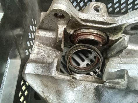 Inspecting The Brake Calipers On The 1973 Dino 246 Gts Bridge Classic