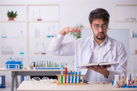 Young Male Chemist In Drugs Synthesis Concept Stock Image Image Of