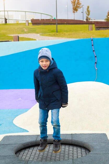 Premium Photo Full Length Portrait Of Boy Standing In Swimming Pool