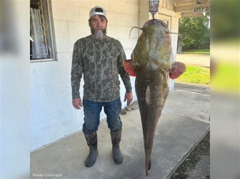 PHOTOS: Man Catches 'Monster' Record-Breaking Catfish in Oklahoma Reservoir
