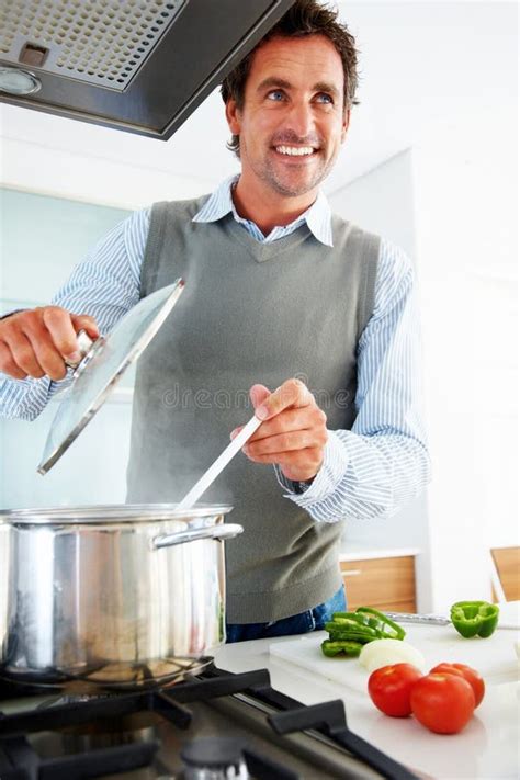 Man Pot And Cooking In Kitchen At House For Healthy Food Lunch And