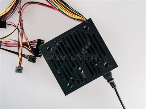 Electrical Power Supply Psu For Computer System Unit Components Isolated On A Grey Background
