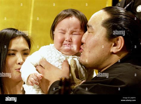 Osaka Japan Mongolian Grand Champion Asashoryu R Kisses His