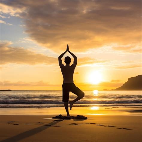 Premium Ai Image A Man Doing Yoga On A Beach With The Ocean And