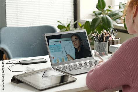 Stock Foto „laptop Screen With Young Successful Teacher Of English Grammar Pointing At