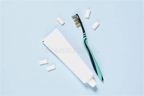 Two Toothbrushes And Toothpaste On A Paper Stock Image Image Of