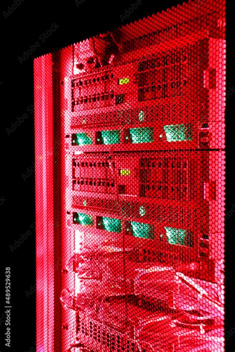 Data Center With Multiple Rows Of Fully Operational Server Racks In