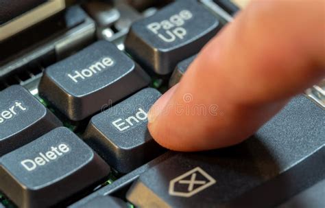 Man Pressing The End Key On A Laptop Computer Keyboard Finger Closeup