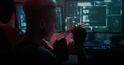 female coder enjoys noodles checking program on monitors technology stock footage ft coder