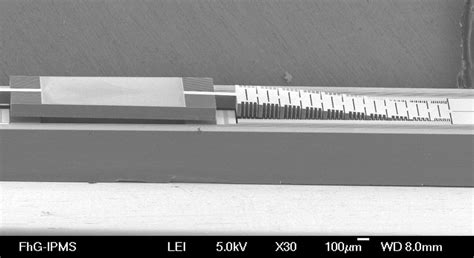 sem photographs of deflected translatory moems devices a moems device