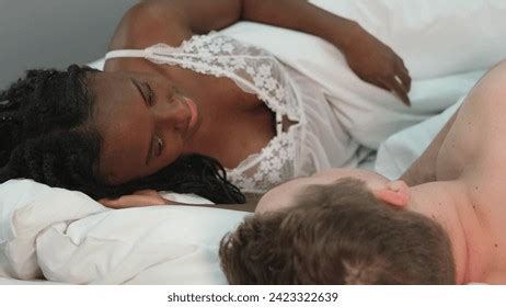 Sensual Multiethnic Couple Kissing Hugging Bed Stock Photo 2421275711 Shutterstock