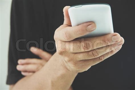 Man Checking His Phone Stock Image Colourbox
