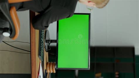 Woman Working On Desktop Computer With Green Screen Mock Up In Modern