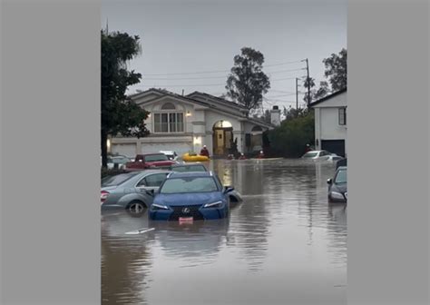 Long Beach Neighborhood Floods Prompting Swift Water Rescues