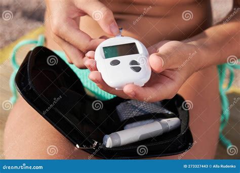 Girl Diabetic Will Check Level Of Sugar In The Blood While Sitting On