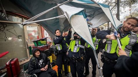 Vancouver Police City Staff Begin Removing Encampment On East Hastings Street Cbc News