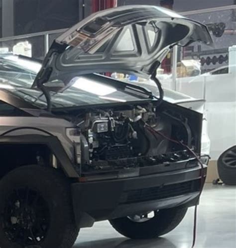Tesla Cybertruck Spotted With Wrap That Makes It Look Like A Ford F 150