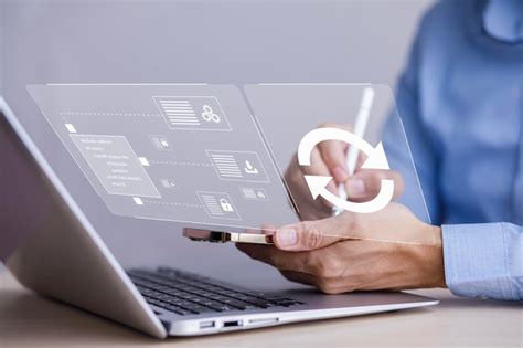 Premium Photo Man Holds A Smartphone With Update Software Computer