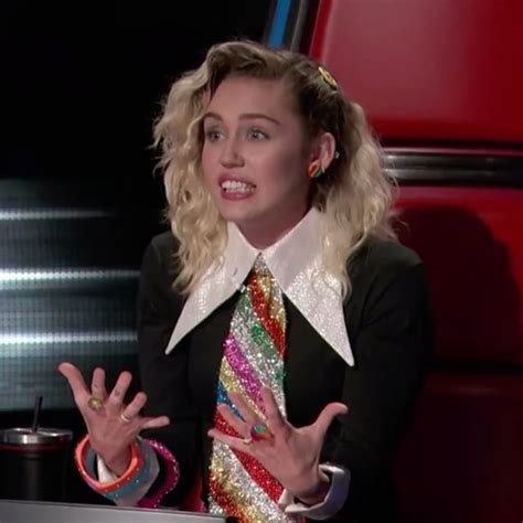 A Woman With Blonde Hair Wearing A Colorful Tie And Dress Shirt On The