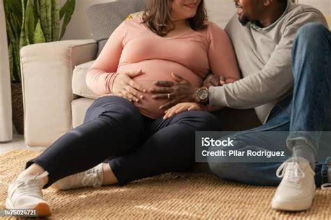 Multi Ethnic Couple Touch Pregnant Womans Belly Stock Photo - Download ...