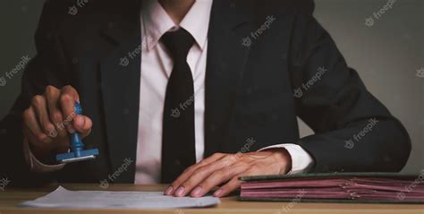 Premium Photo Businessman Person With A Stamp Of Approval On A Public